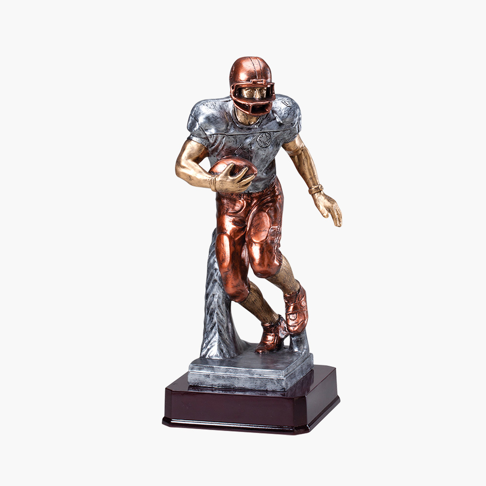 Antique Resin Football Runner Award - Crystal Images, Inc.